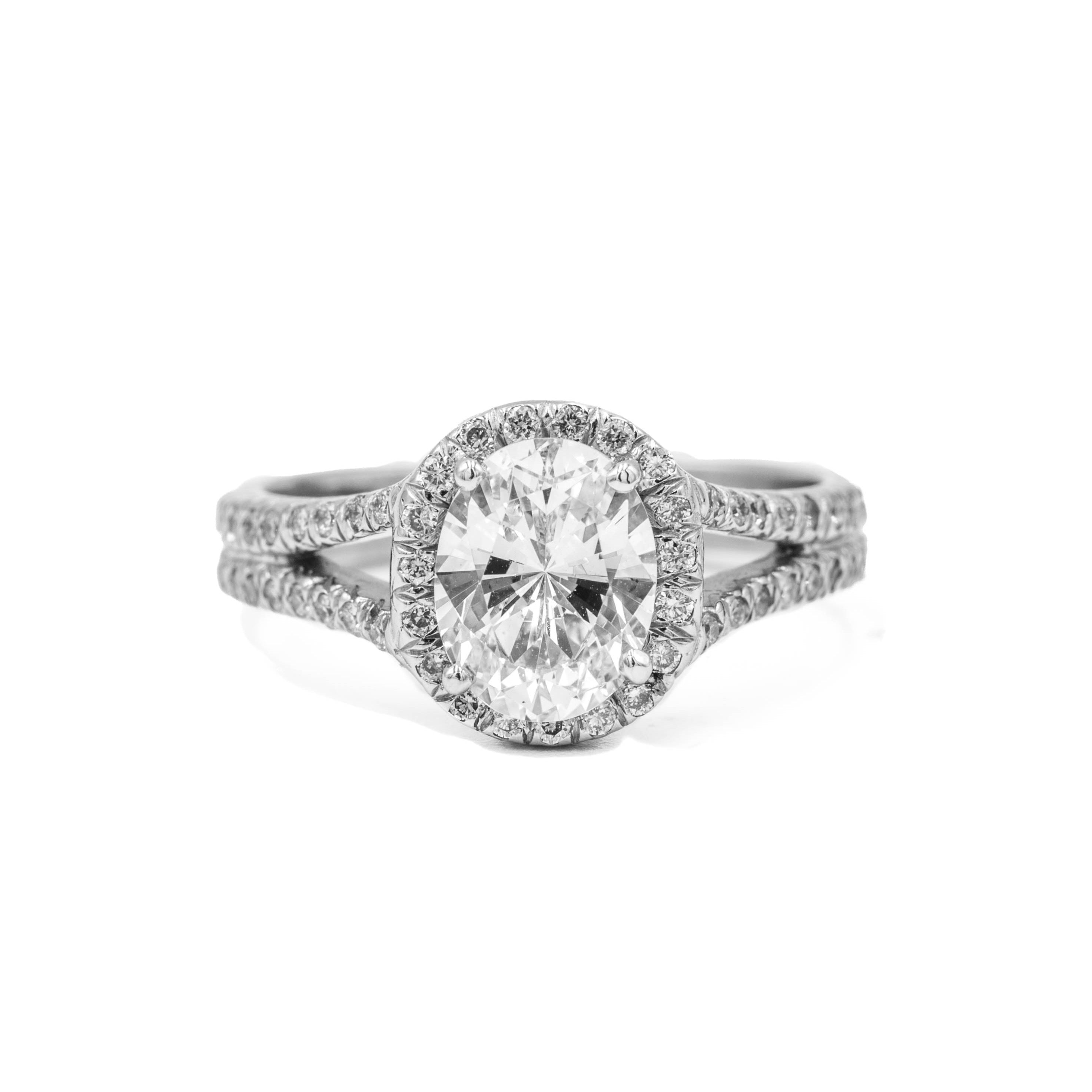 14kw .50ctw Oval Split Shank Halo Diamond Ring